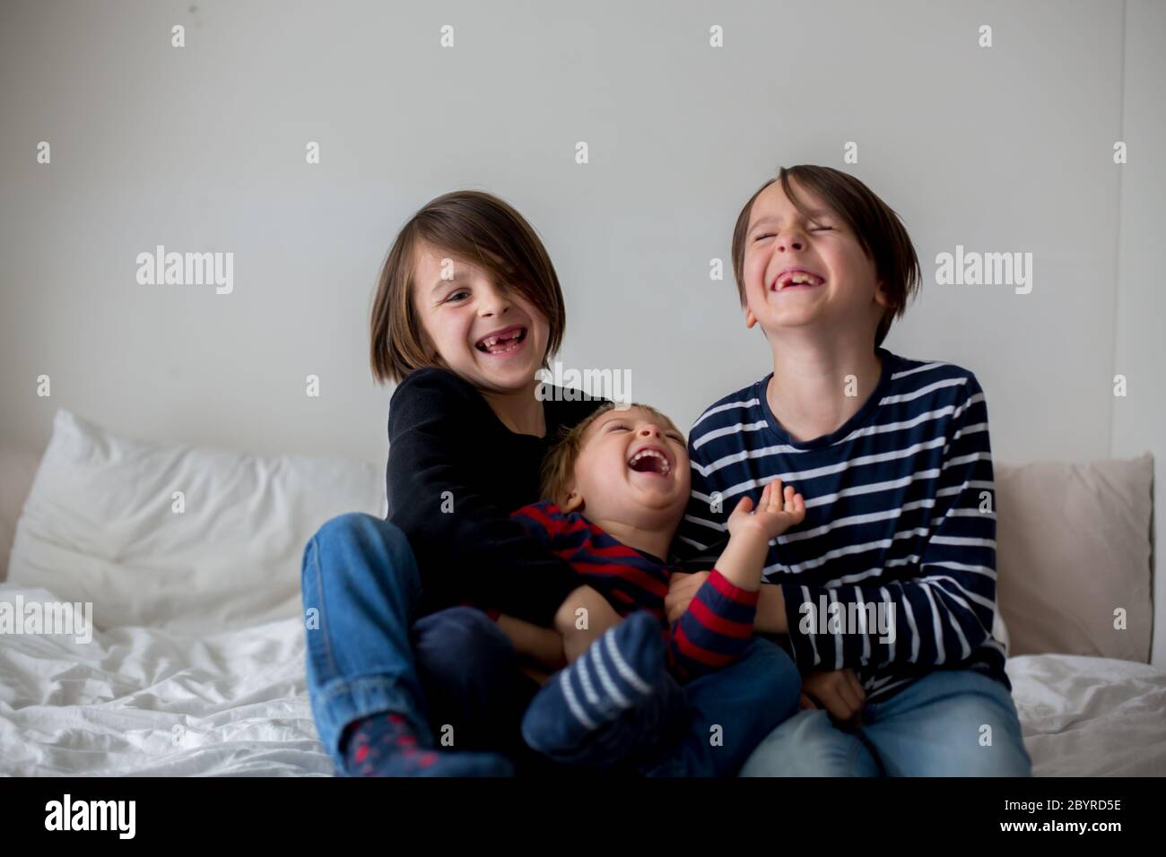 Happiness giggle giggling toothy smile hi-res stock photography and ...