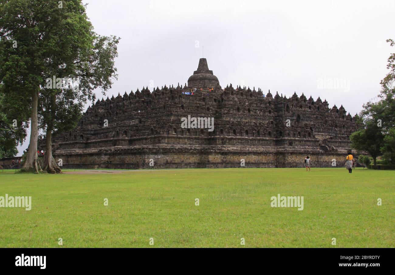 BOROBUDUR, INDONESIA - June 10, 2013: Visitors at Borobudur temple ...