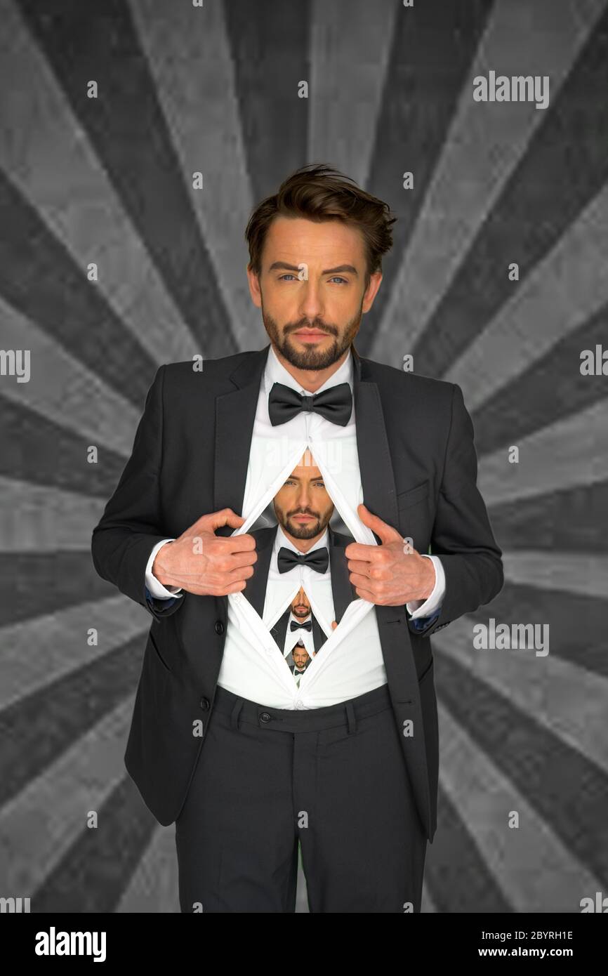 Handsome man in a suit baring his chest Stock Photo - Alamy
