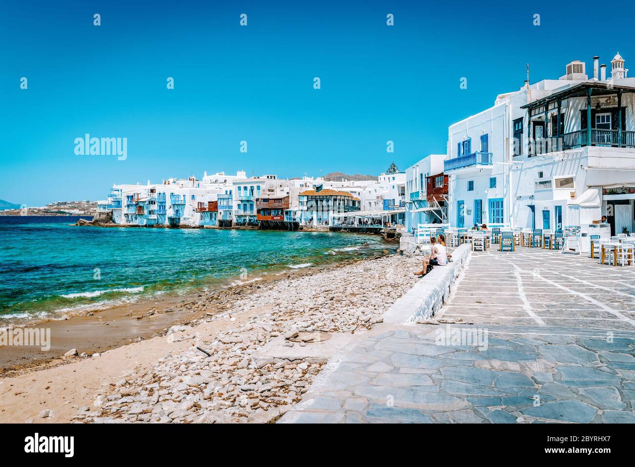 Mykonos Greece Island with whitewashed building at the streets of ...