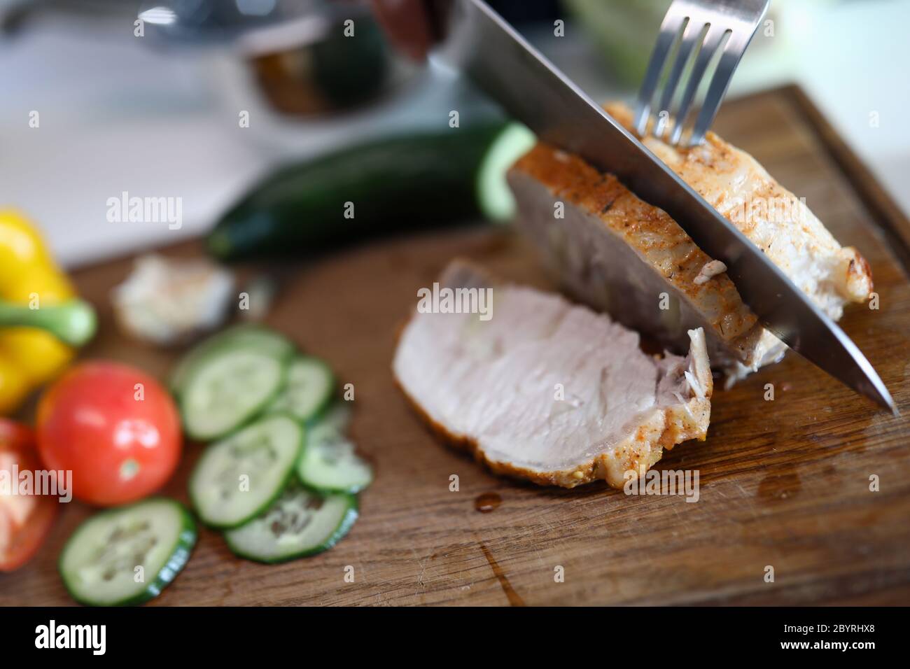 Female prepare dinner for family Stock Photo - Alamy