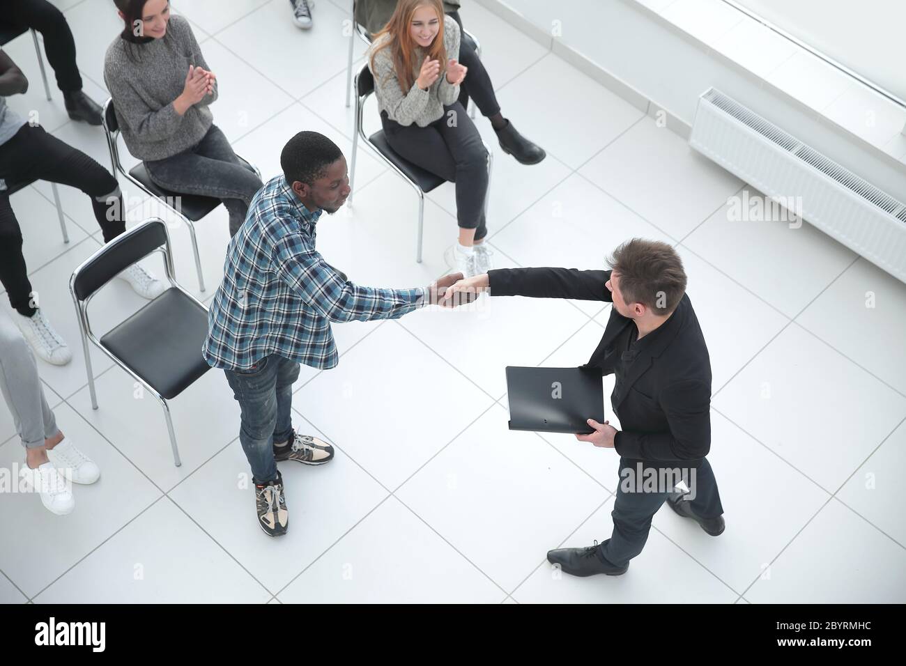 Image from above of business people sitting around conference de Stock ...