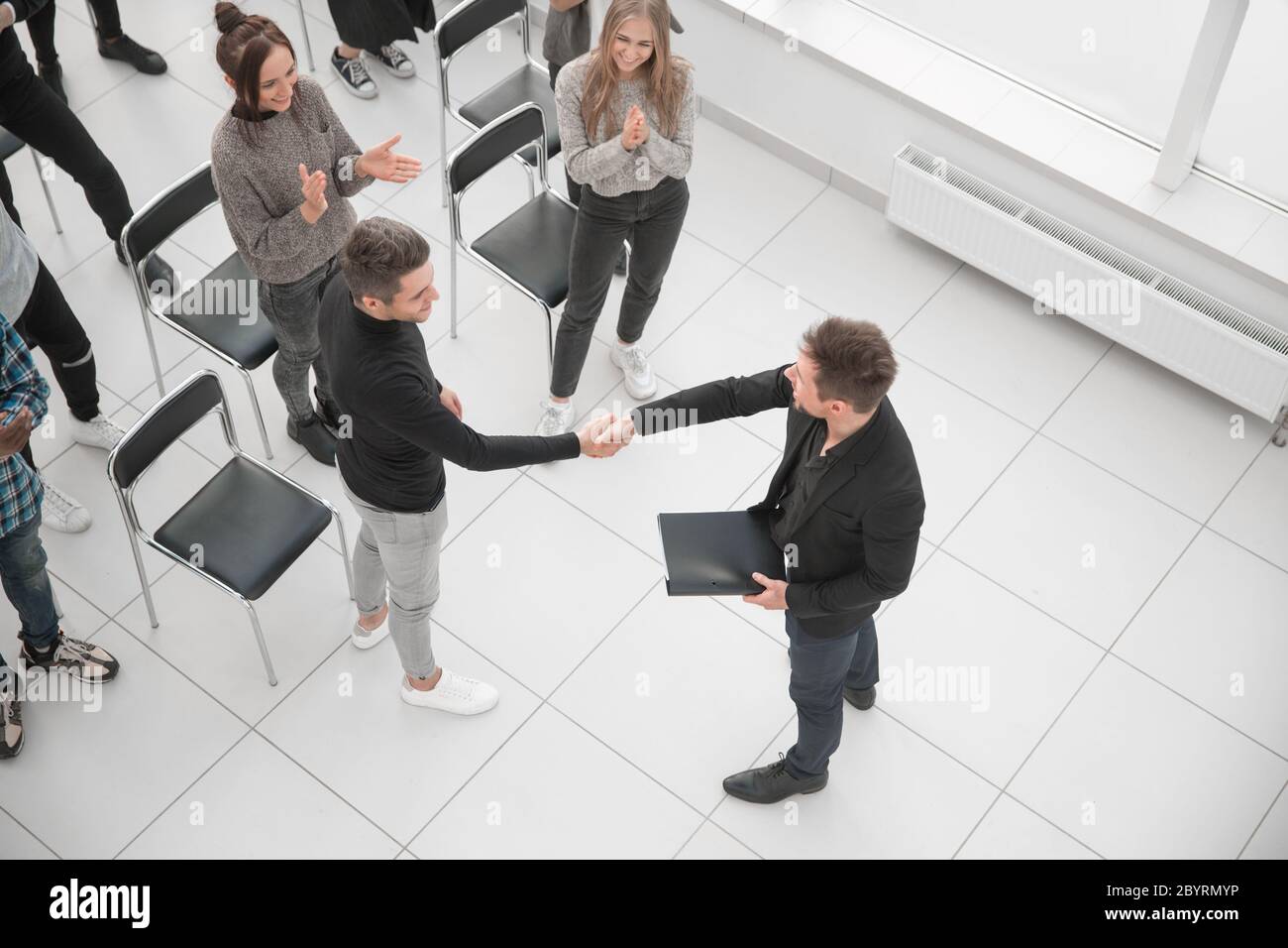 Image from above of business people sitting around conference de Stock ...