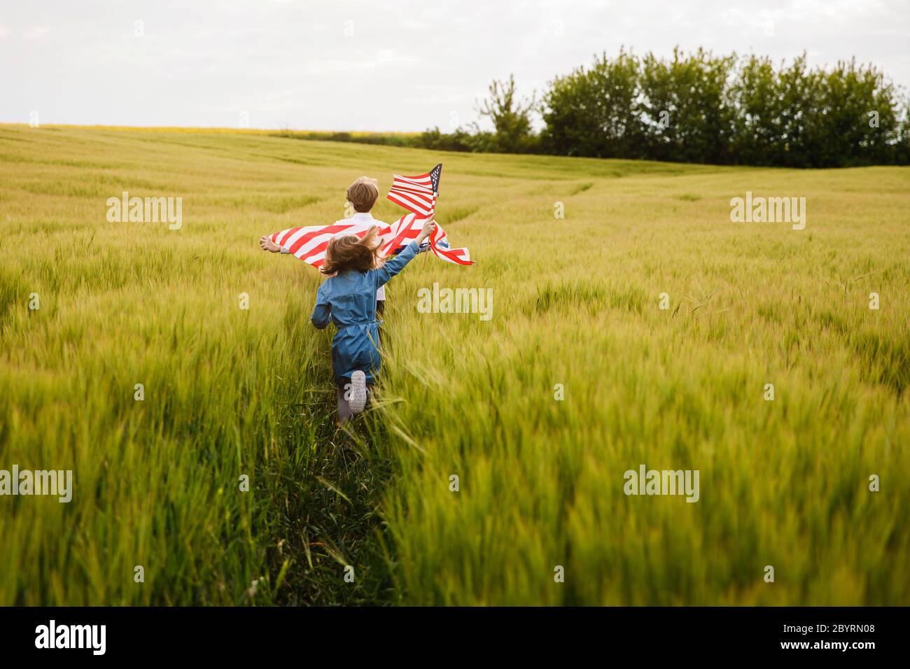 Us girl running flag hi-res stock photography and images - Alamy