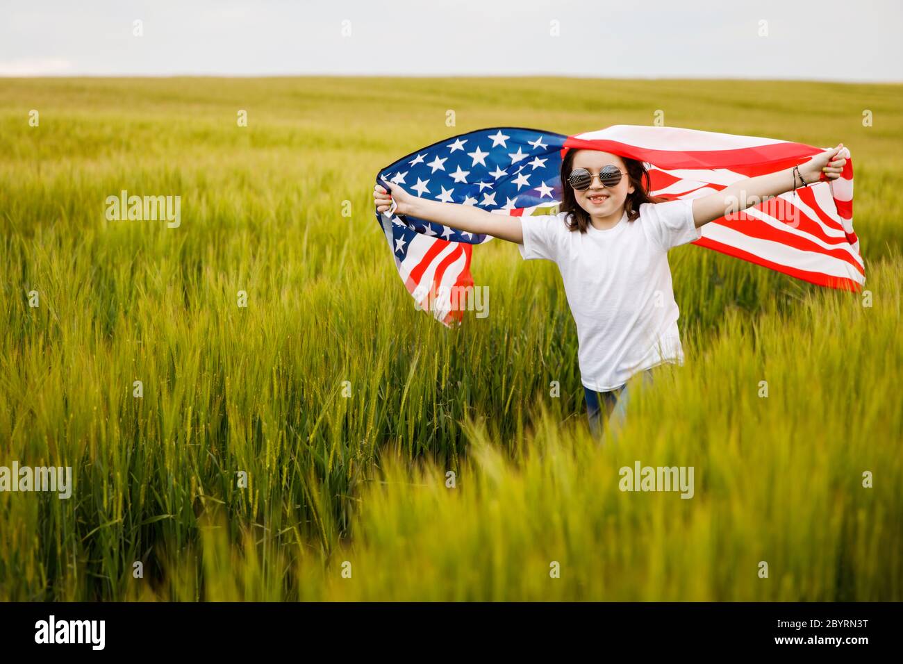 Us girl running flag hi-res stock photography and images - Alamy