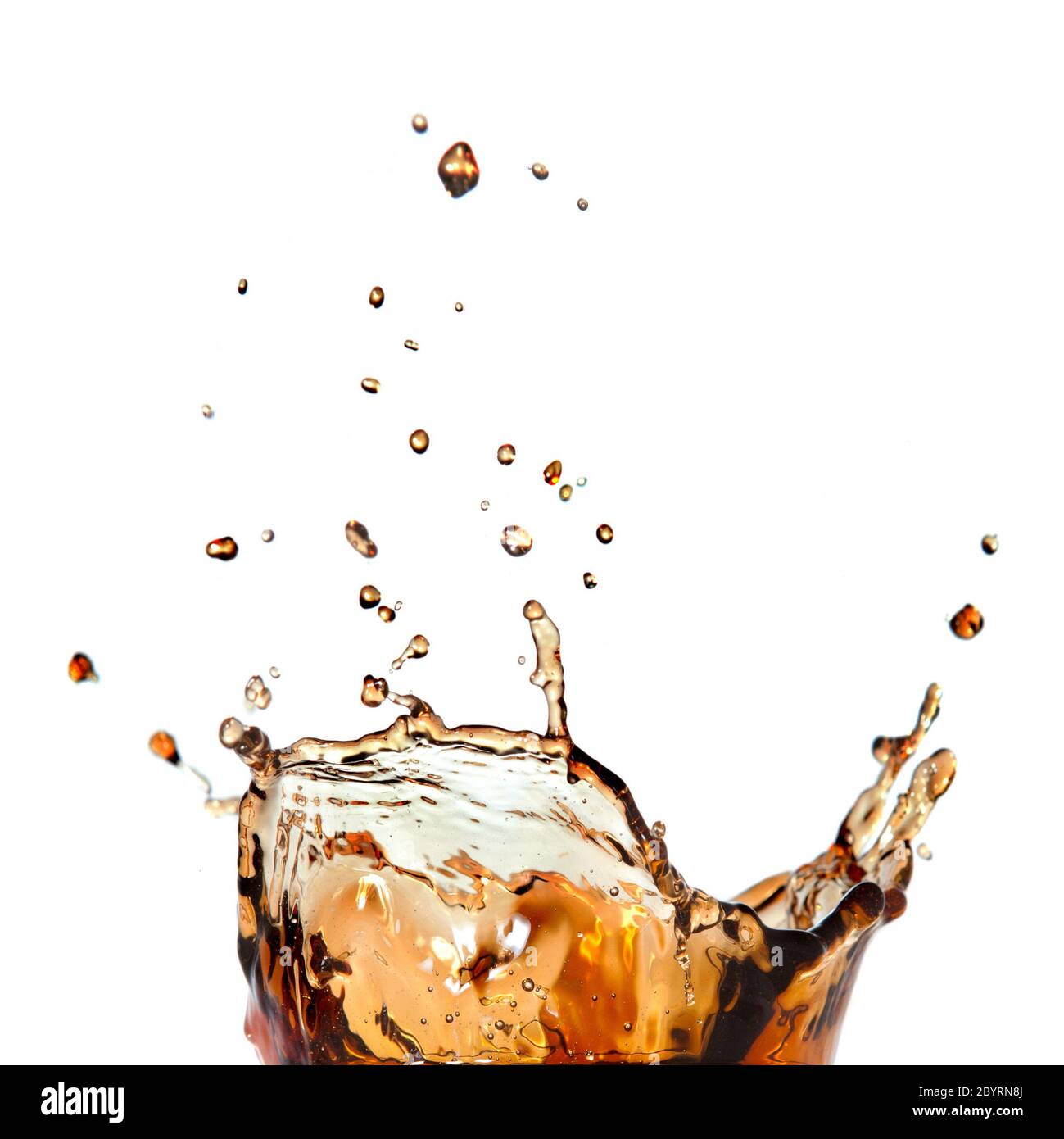splash of cola in glass isolated on white Stock Photo - Alamy