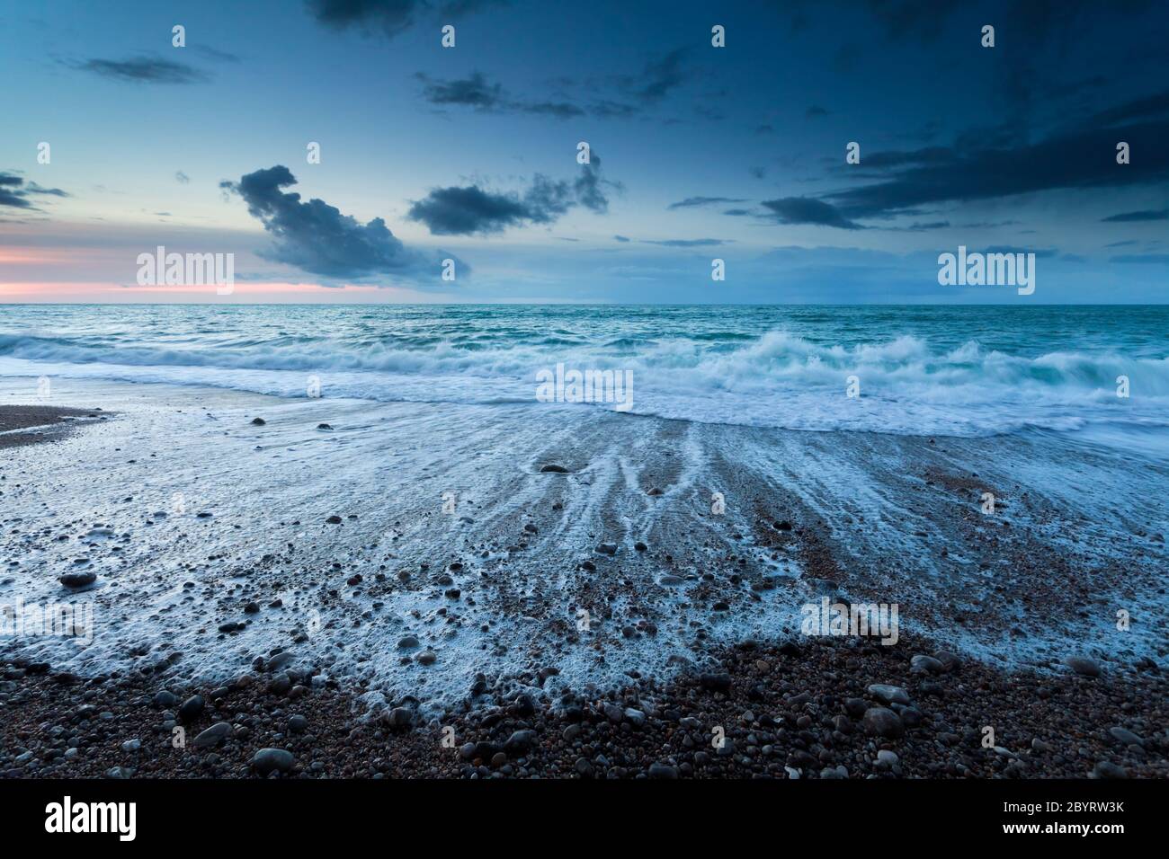 Atlantic ocean beach at dusk Stock Photo - Alamy