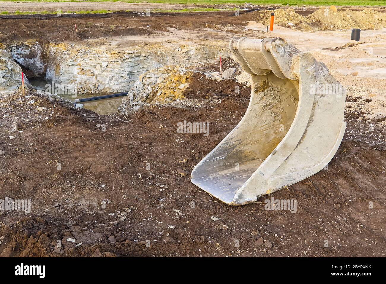 Excavator Bucket. Excavator bucket on ground, Industrial excavator ... Excavator Bucket. Excavator bucket on ground, Industrial excavator ...