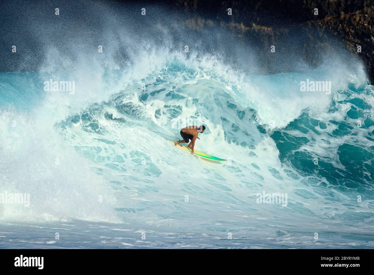 Adult surfer (model released) in surf barrel at Manini in Kealakekua ...