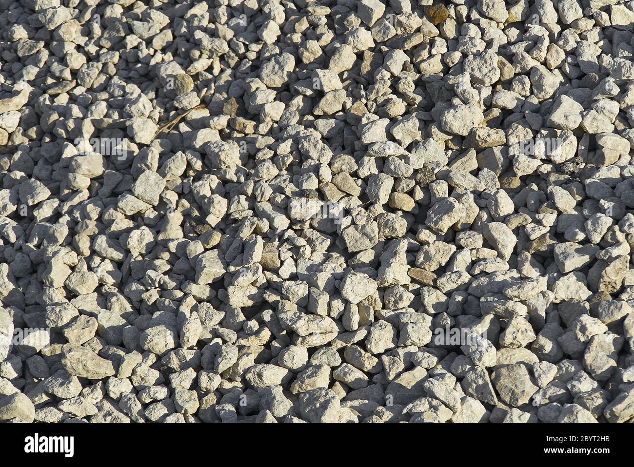 large crushed stone texture. Small pebble stones on construction site ...