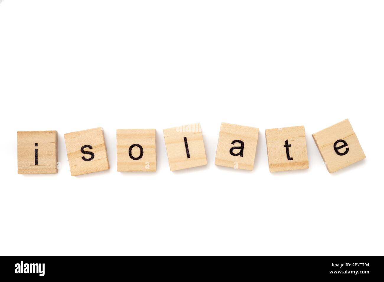 Wood letter tiles spelling the word ISOLATE on a white background Stock ...
