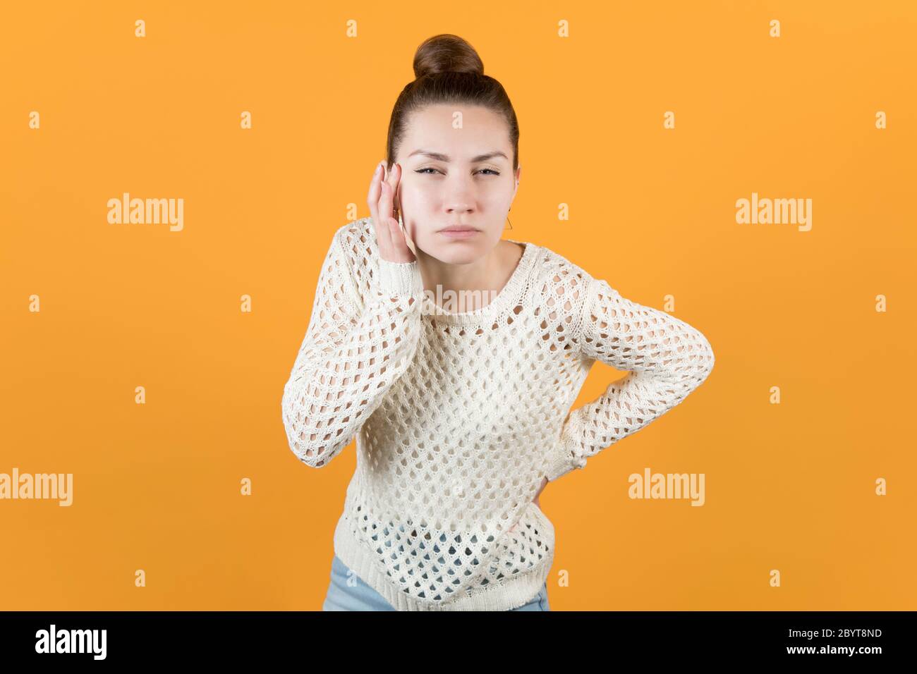 visually impaired girl peers at something Stock Photo - Alamy