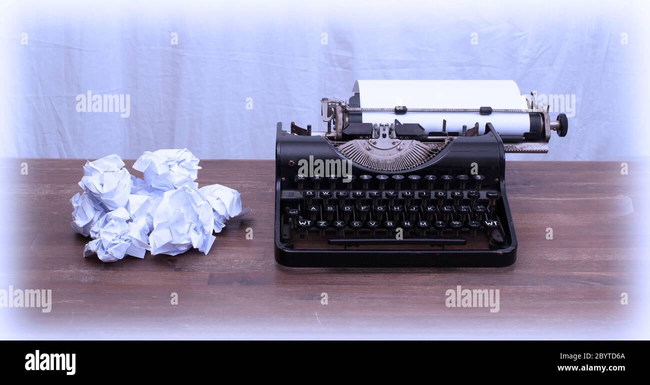 Vintage typewriter and old books Stock Photo - Alamy