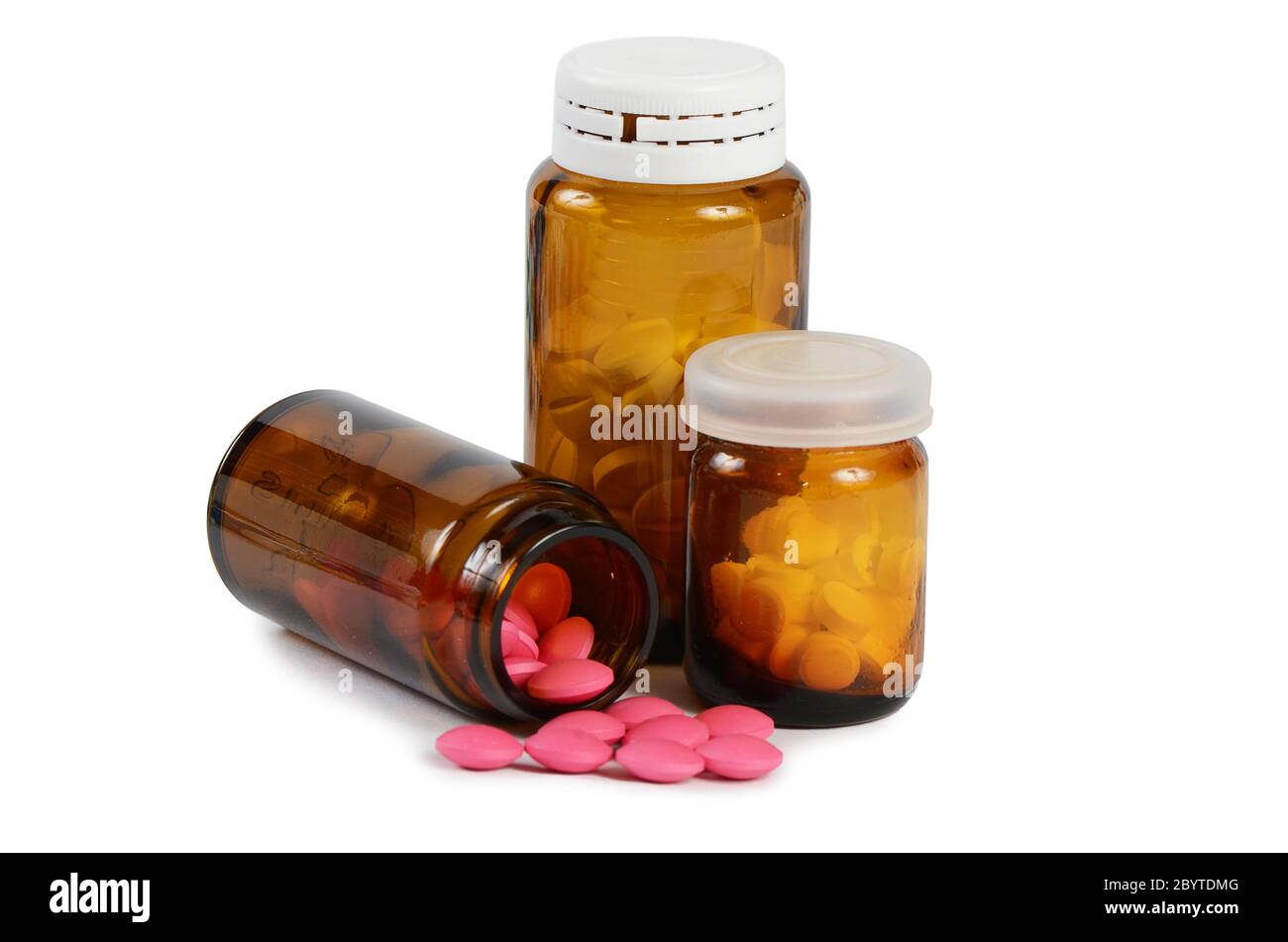 Tablets to a glass jar isolated on white Stock Photo - Alamy