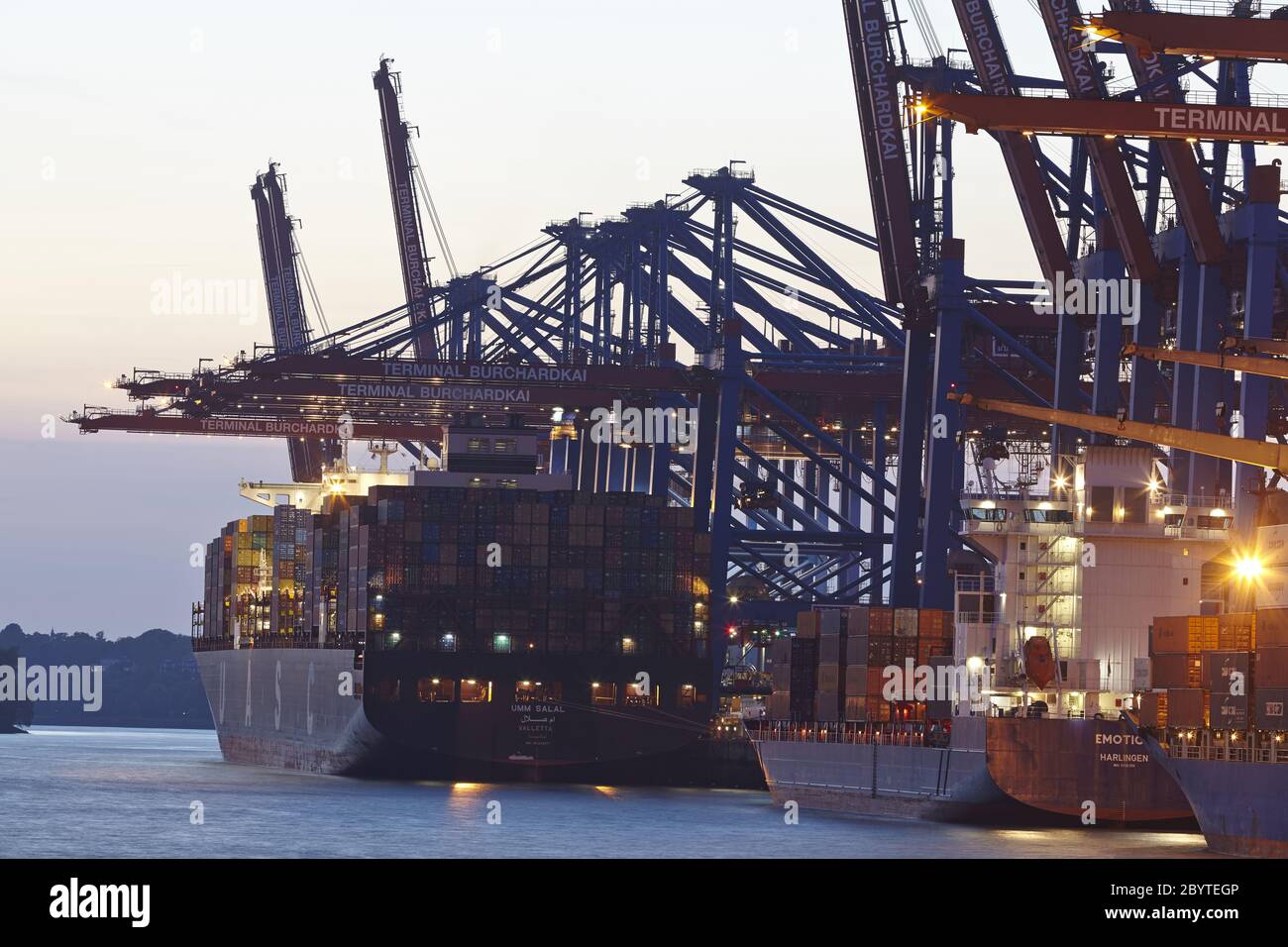 Hamburg - Container ship at the terminal (evening Stock Photo - Alamy