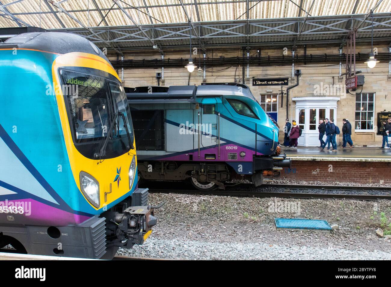 A TransPennine Expressl passenger train at Huddersfield Railway Station ...