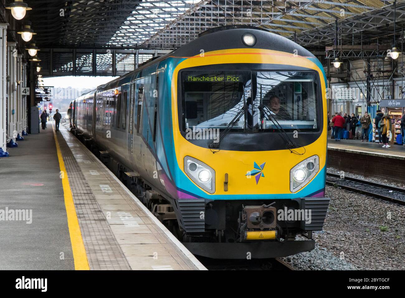 A TransPennine Expressl passenger train at Huddersfield Railway Station ...