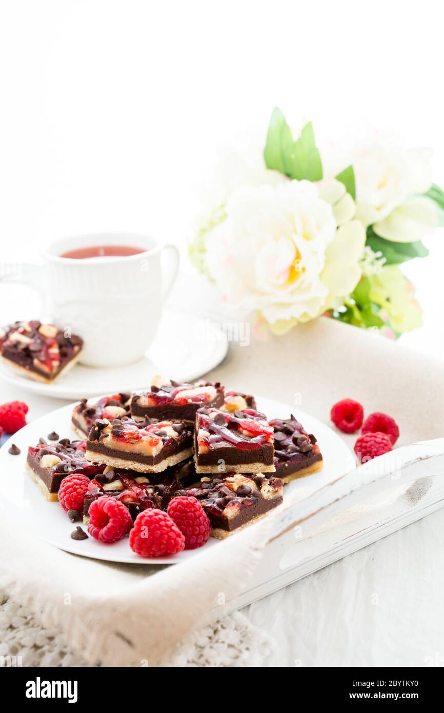Chocolate raspberry squares Stock Photo - Alamy