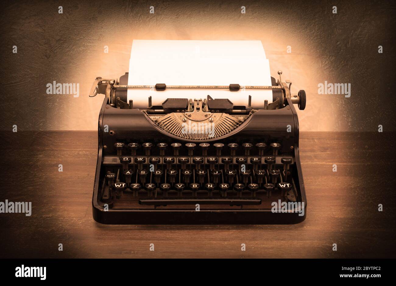 Vintage typewriter and old books Stock Photo - Alamy