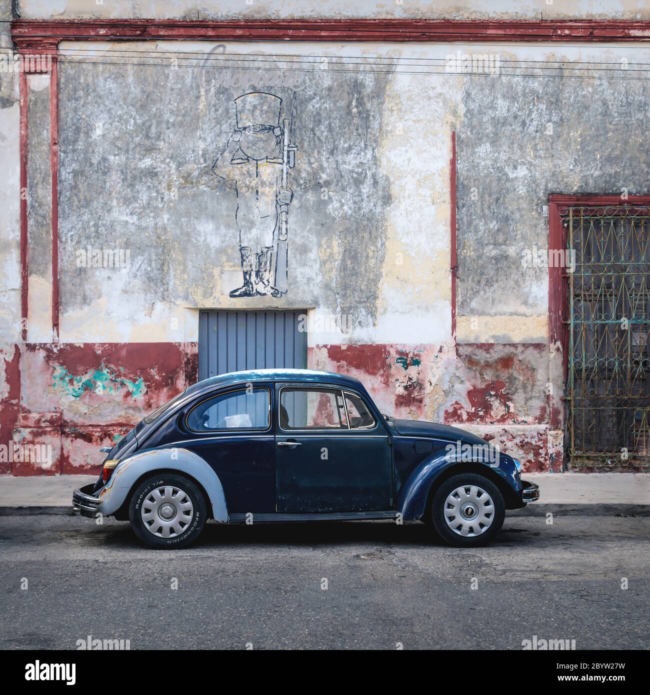 Blue Oldtimer Volkswagen Beetle in the colonial street of Merida ...