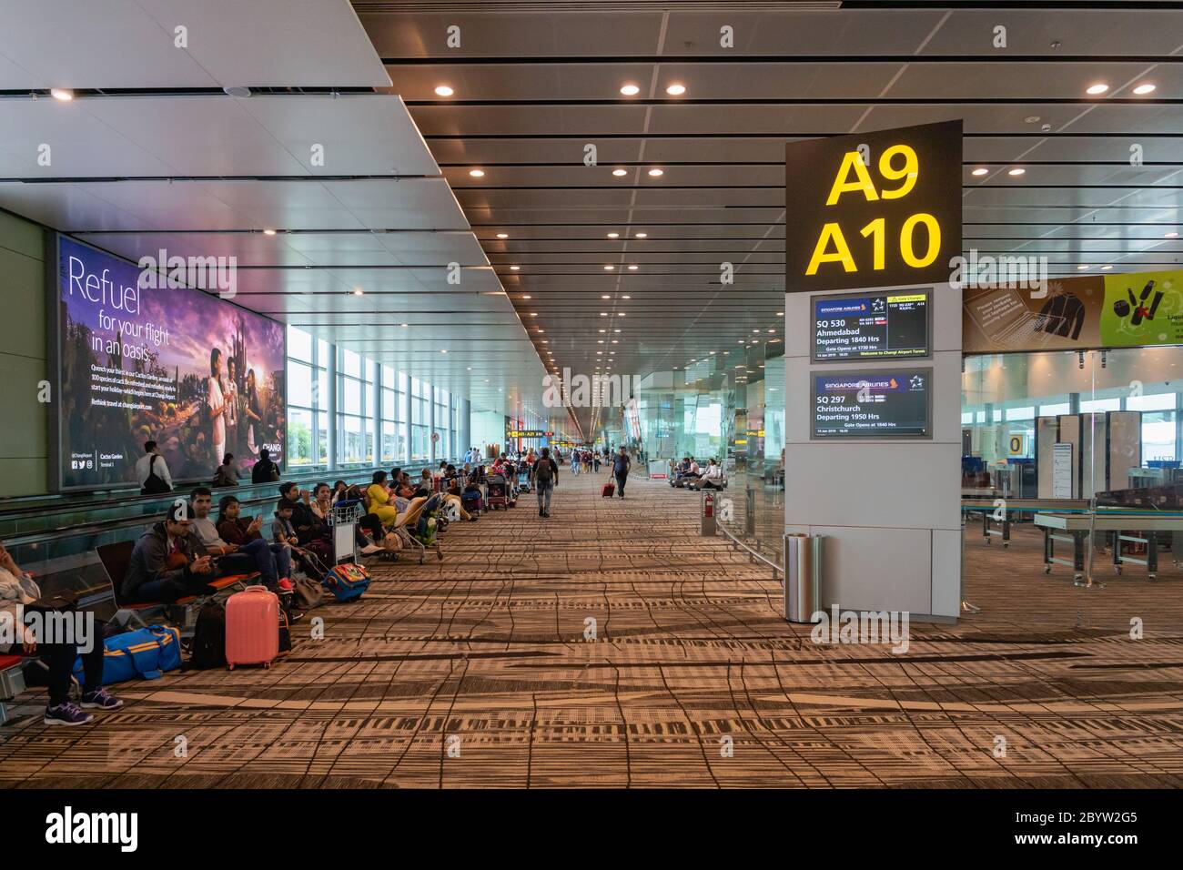 Singapore - January 2019: Singapore Changi Airport architecture and passengers. Singapore ...