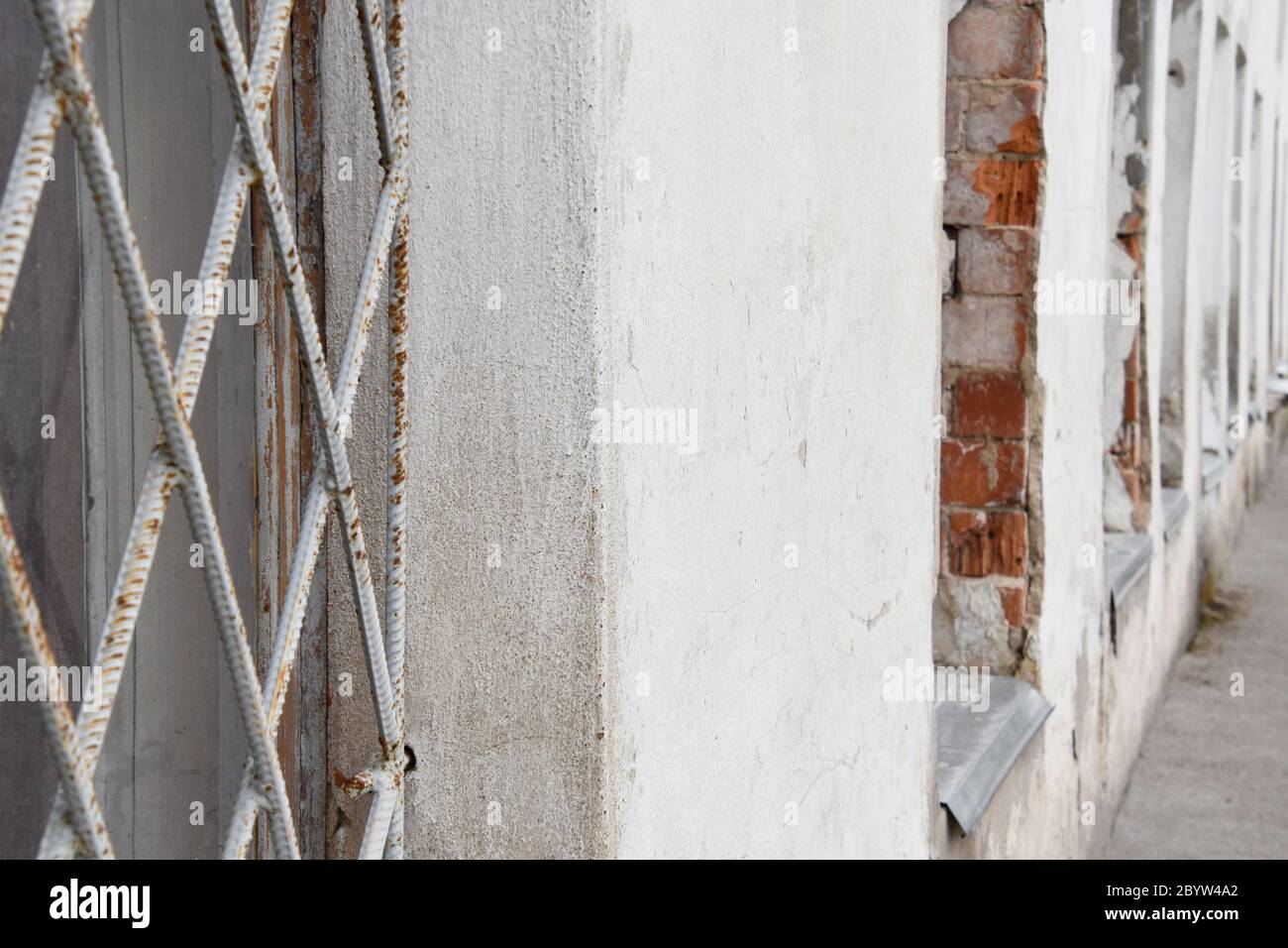Iron window grid windows on a low first level apartments Stock Photo ...