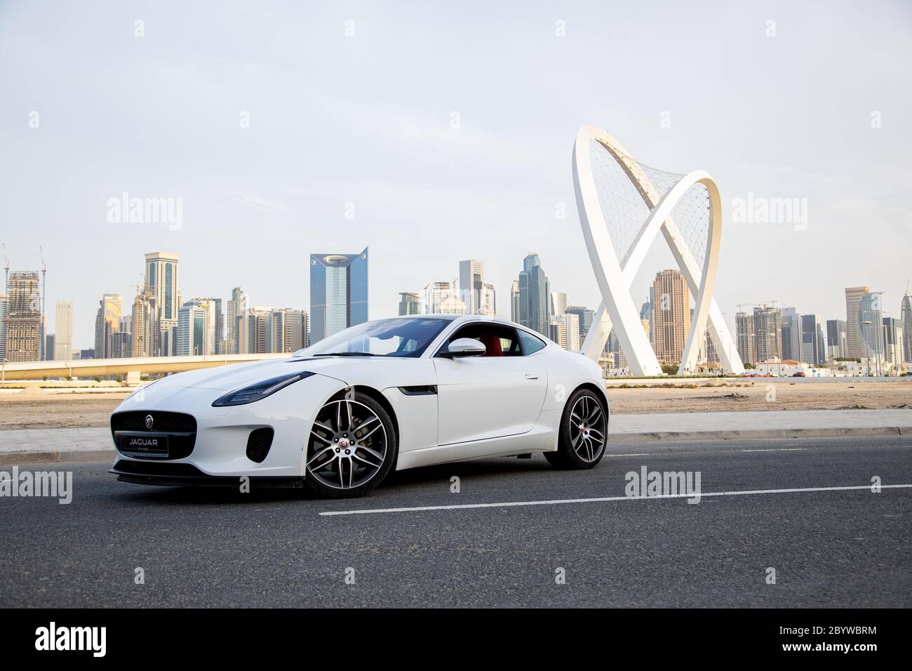 Sports car Jaguar F-Type V8S Convertible White on Doha Road Stock Photo ...