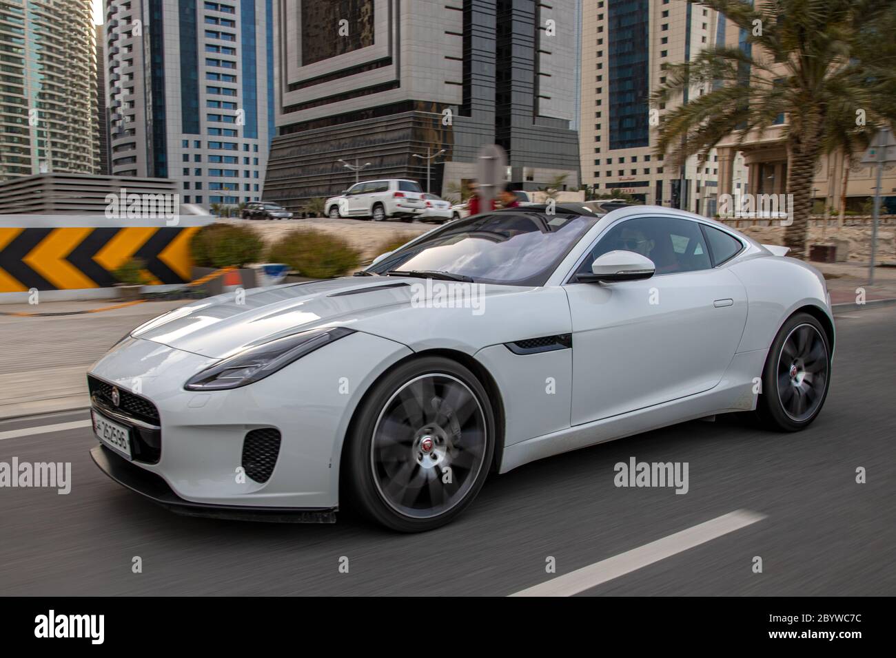 Sports car Jaguar F-Type V8S Convertible White on Doha Road Stock Photo ...