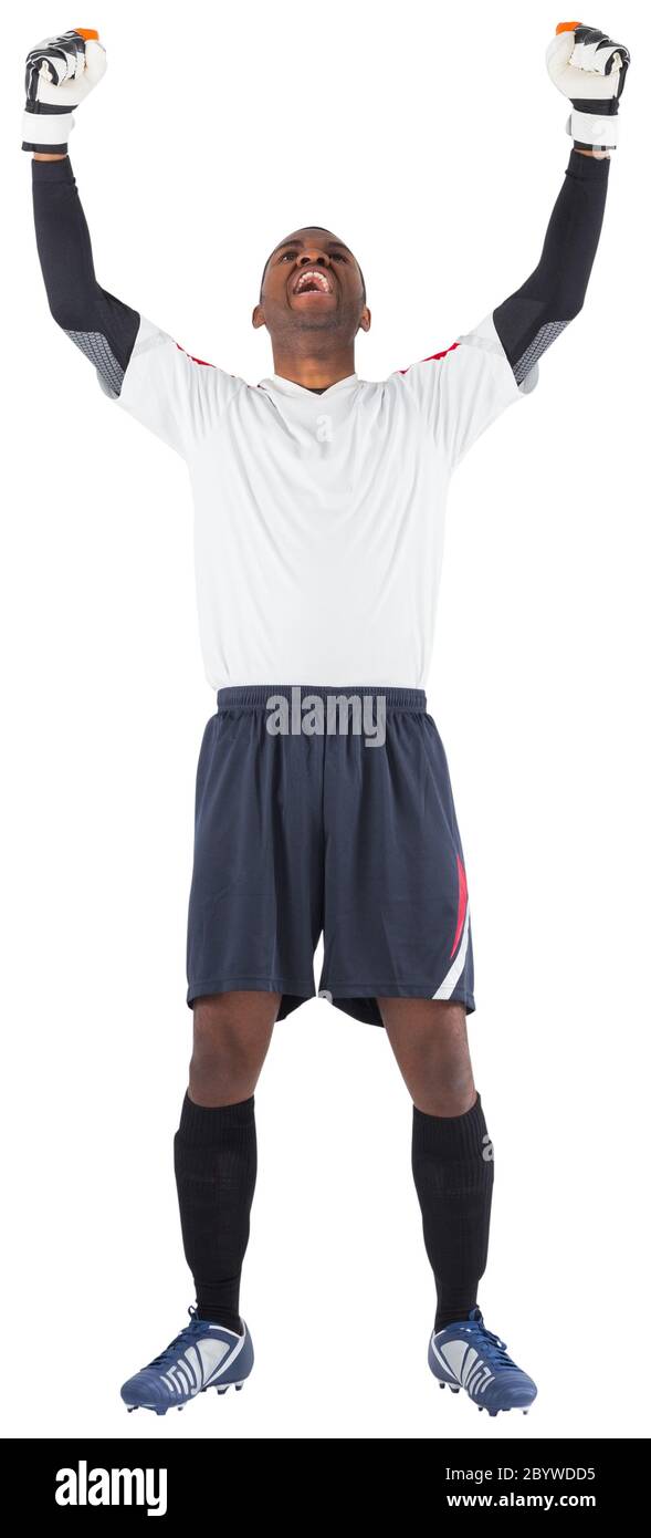 Excited goalkeeper in white cheering Stock Photo - Alamy