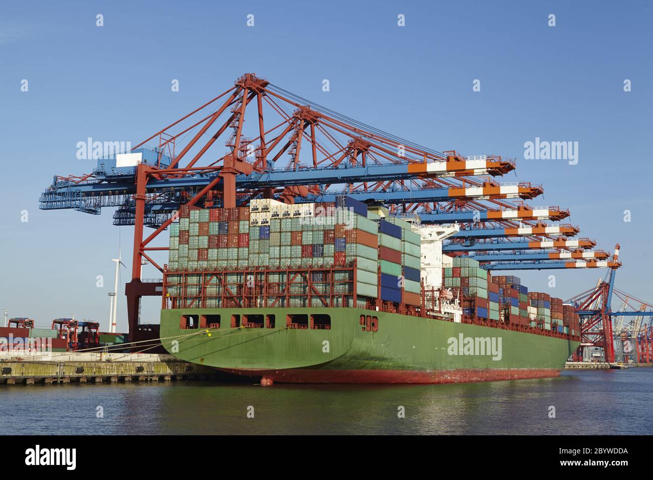 Container ship at the container terminal Stock Photo - Alamy