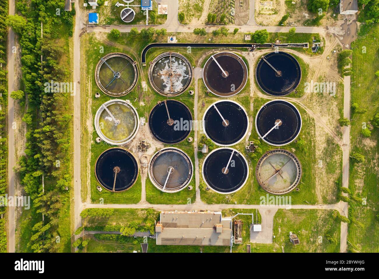 Modern wastewater treatment plant. Water purification tanks, aerial top ...