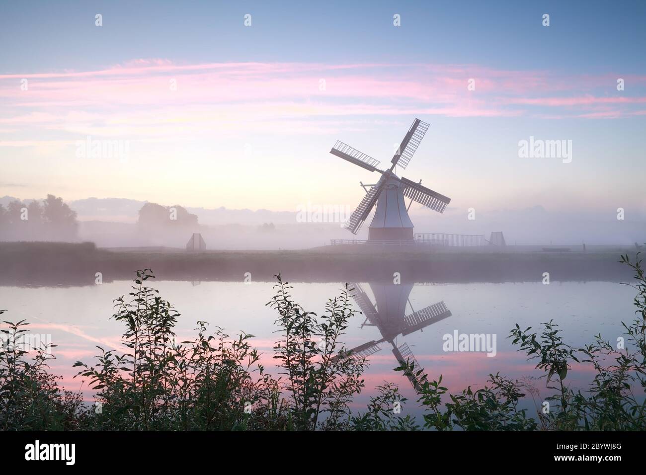 Landscape windmill sunrise river hi-res stock photography and images ...