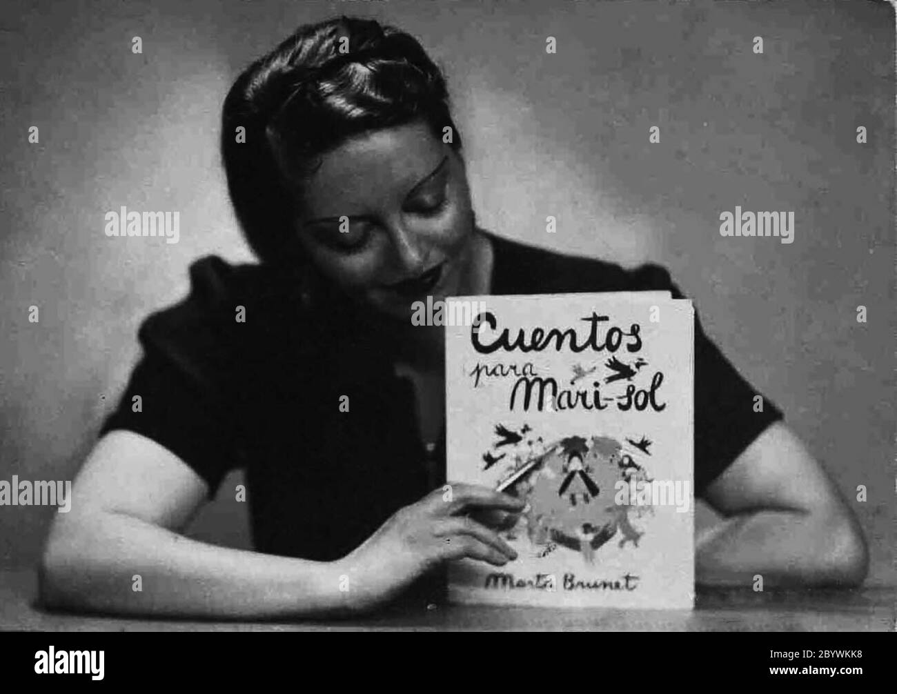 Marta Brunet presenting her book Cuentos para Marisol, 1938 Stock Photo ...