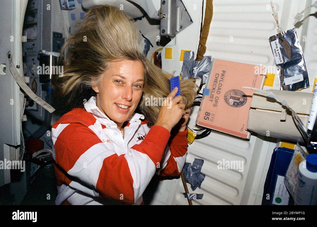 (7 - 19 August 1997) --- Astronaut N. Jan Davis spends a moment of her ...