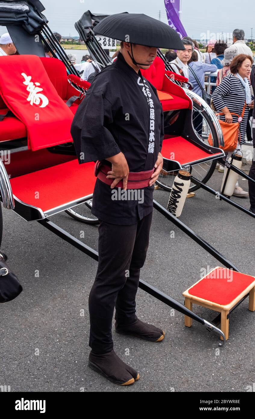 Japanese rickshaw puller at Suigo Itako Iris Festival, Ibaraki, Japan ...