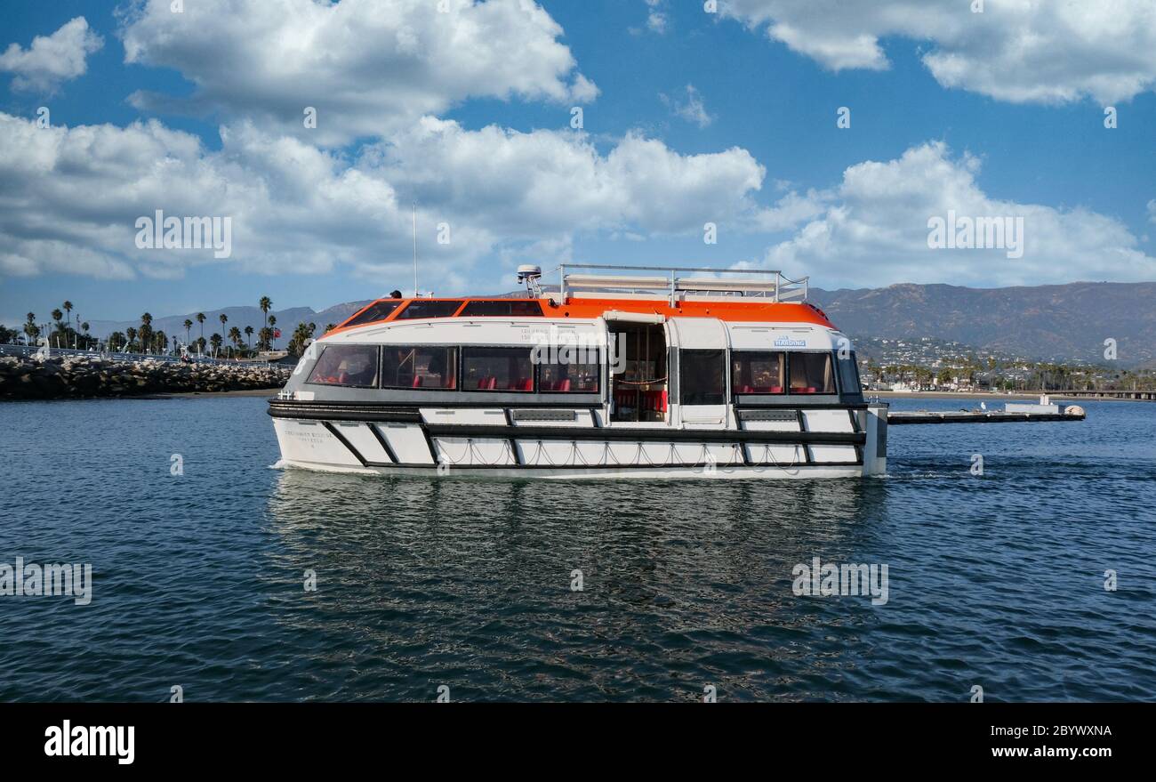 LIfeboat on Blue Stock Photo - Alamy