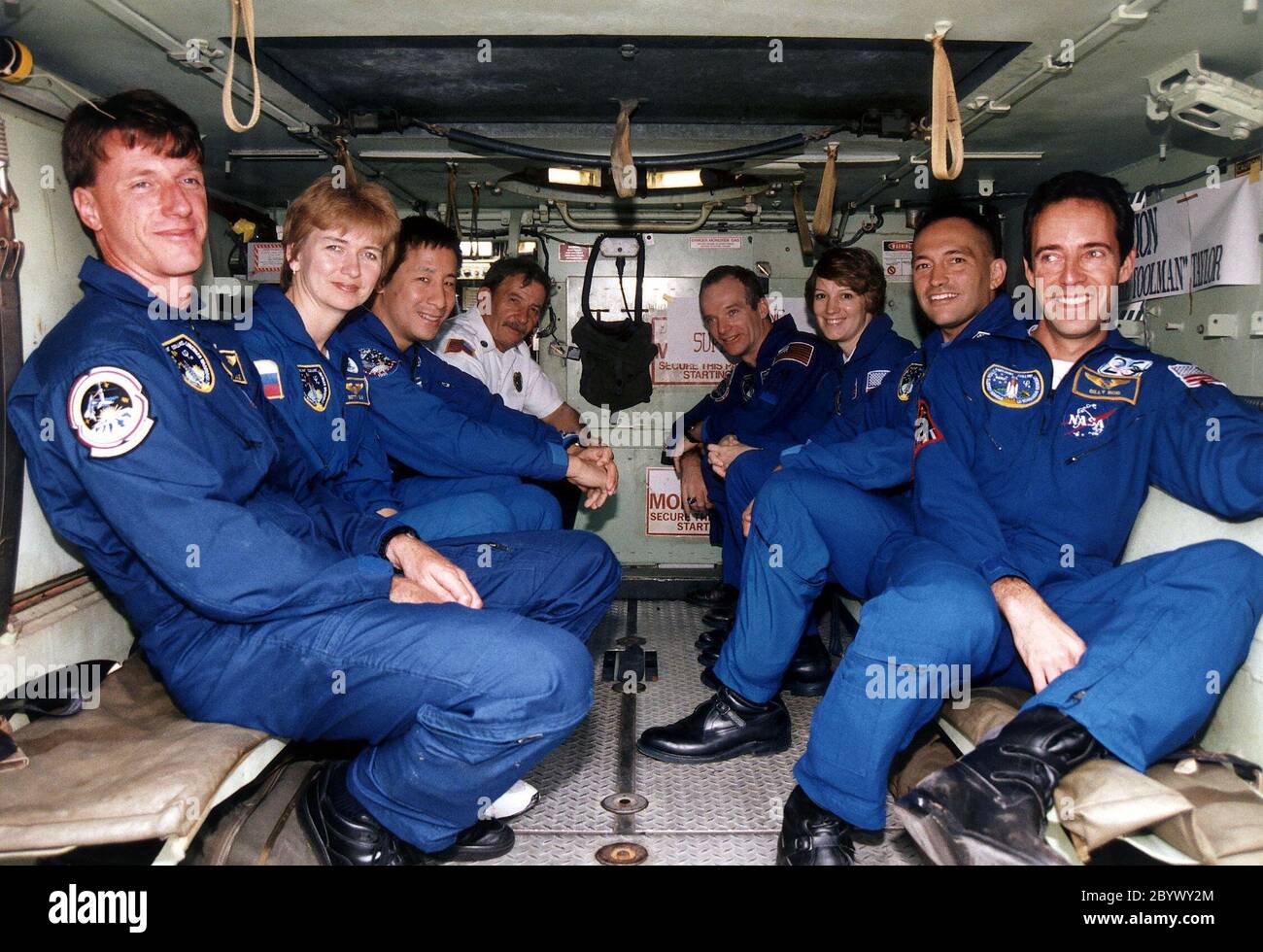 The STS-84 crew gets a ride in an M-113 armored personnel carrier while participating in ...