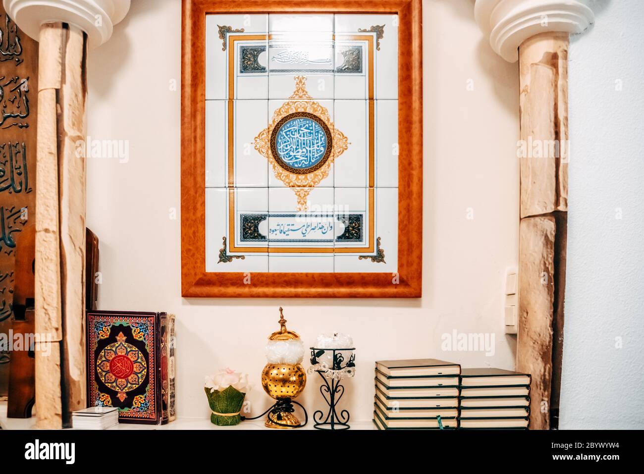 Muslim religious symbols and Koranic books Stock Photo - Alamy
