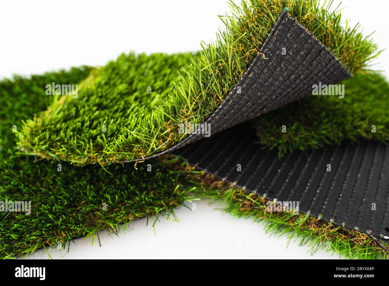 Sample pieces of green artificial grass of different thickness Stock ...