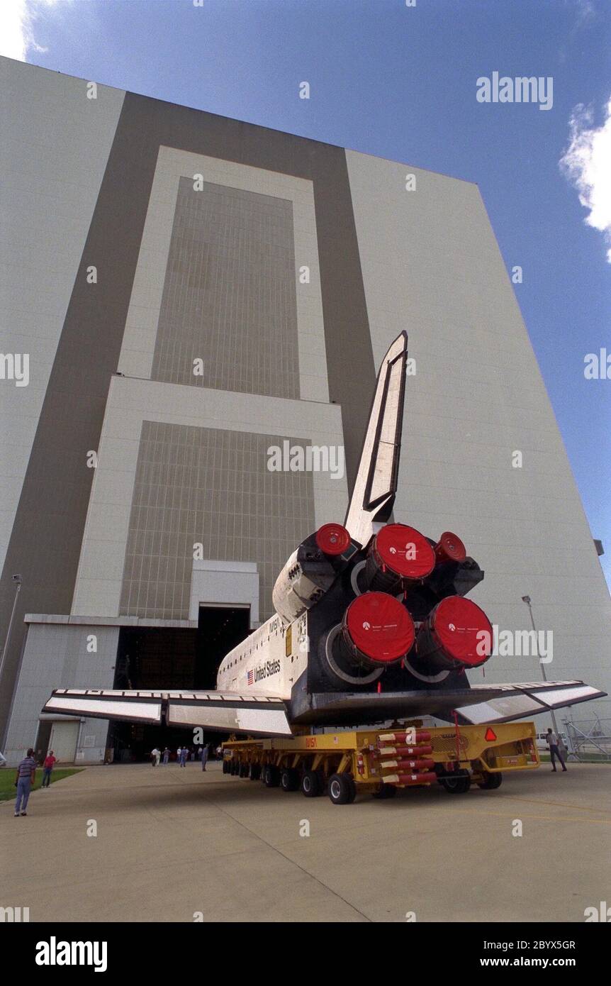 The Space Shuttle Orbiter Discovery rolls over from Orbiter Processing ...