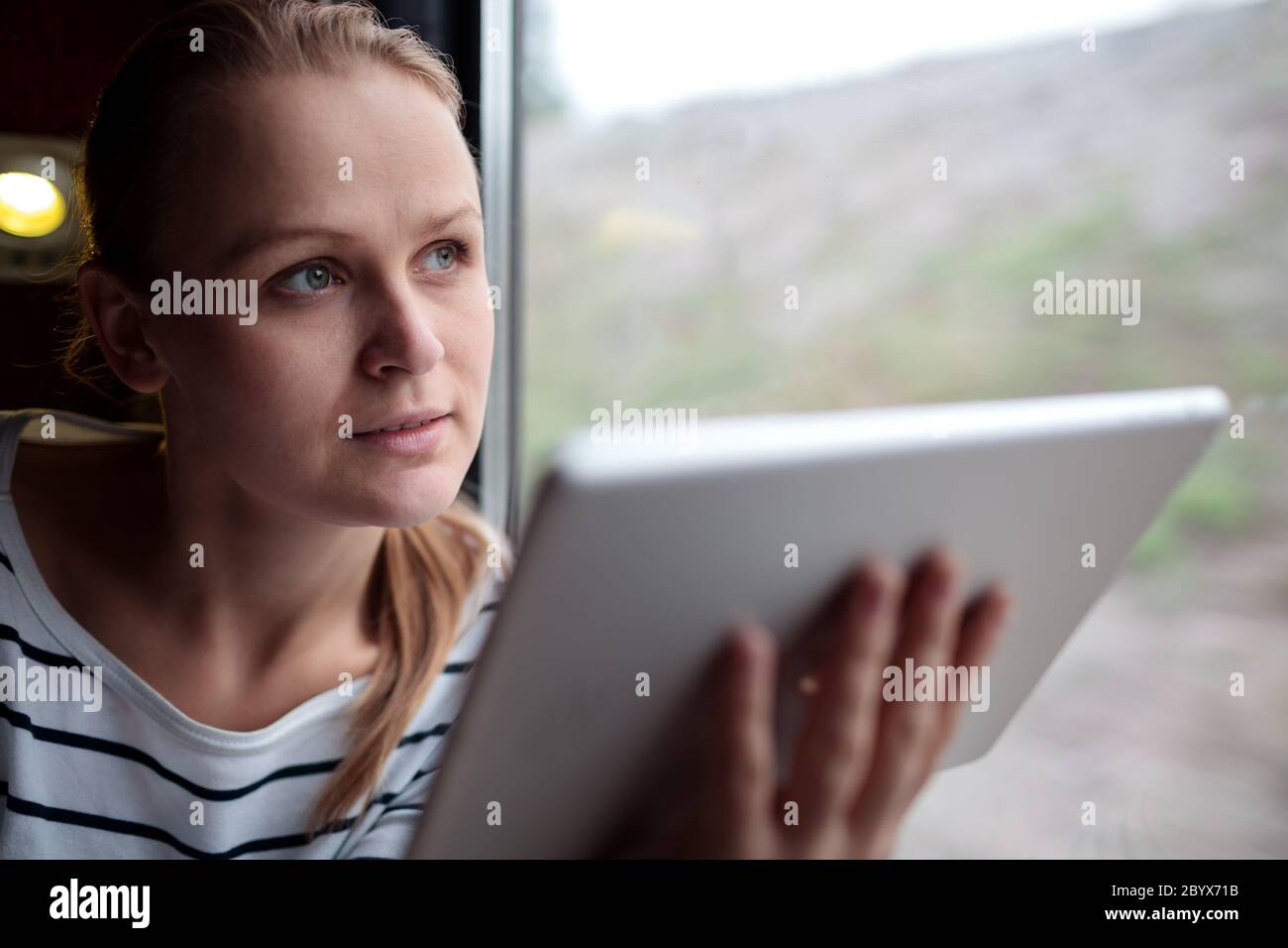 Watch tablet and train hi-res stock photography and images - Alamy
