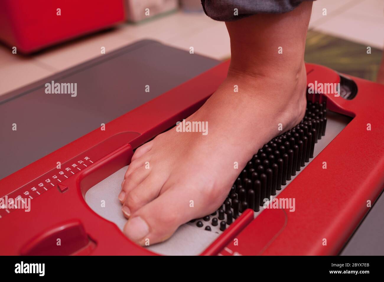 Foot during scanning on device Stock Photo - Alamy