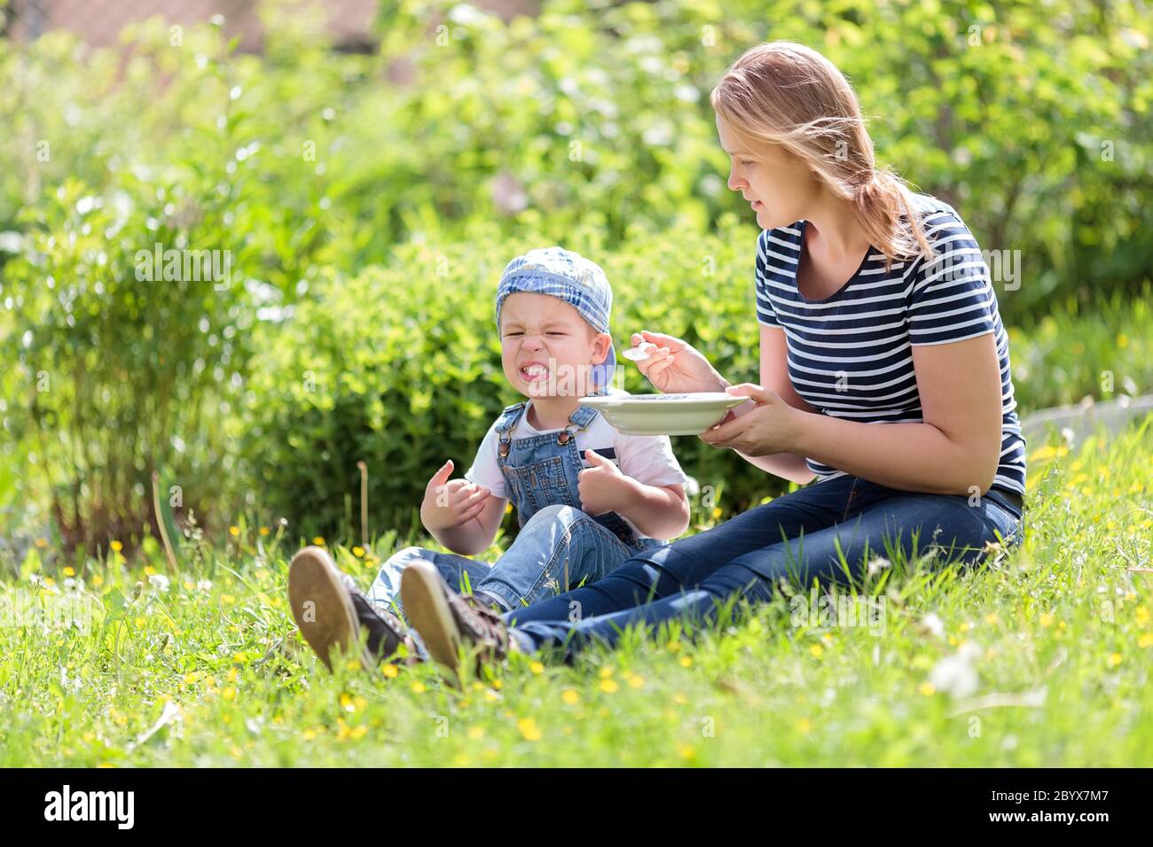 Being fed grass hi-res stock photography and images - Alamy