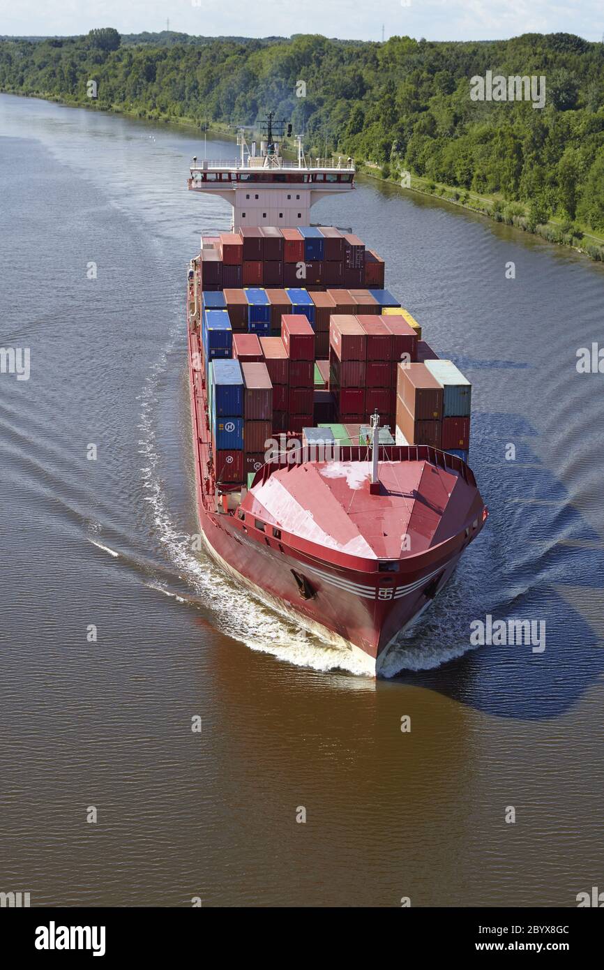 Beldorf - Container vessel on the Kiel-Canal Stock Photo - Alamy
