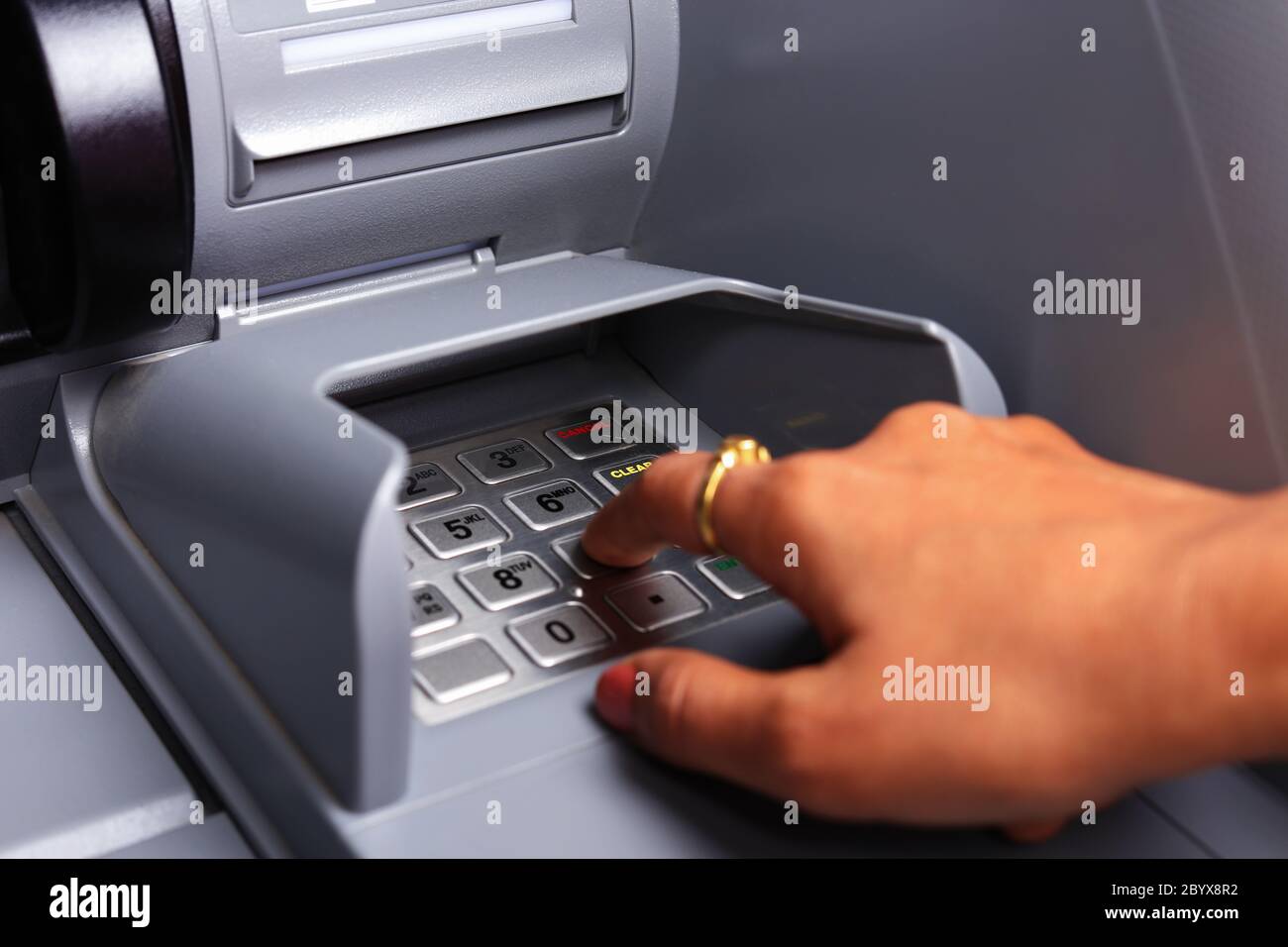 Close Up of Female Hand entering Personal Identification Number at an ...