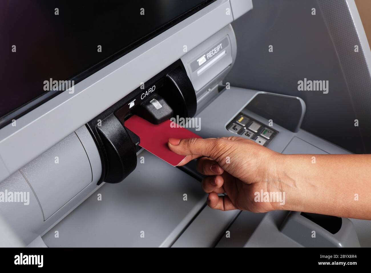 Inserting Credit Card In Atm High Resolution Stock Photography and ...
