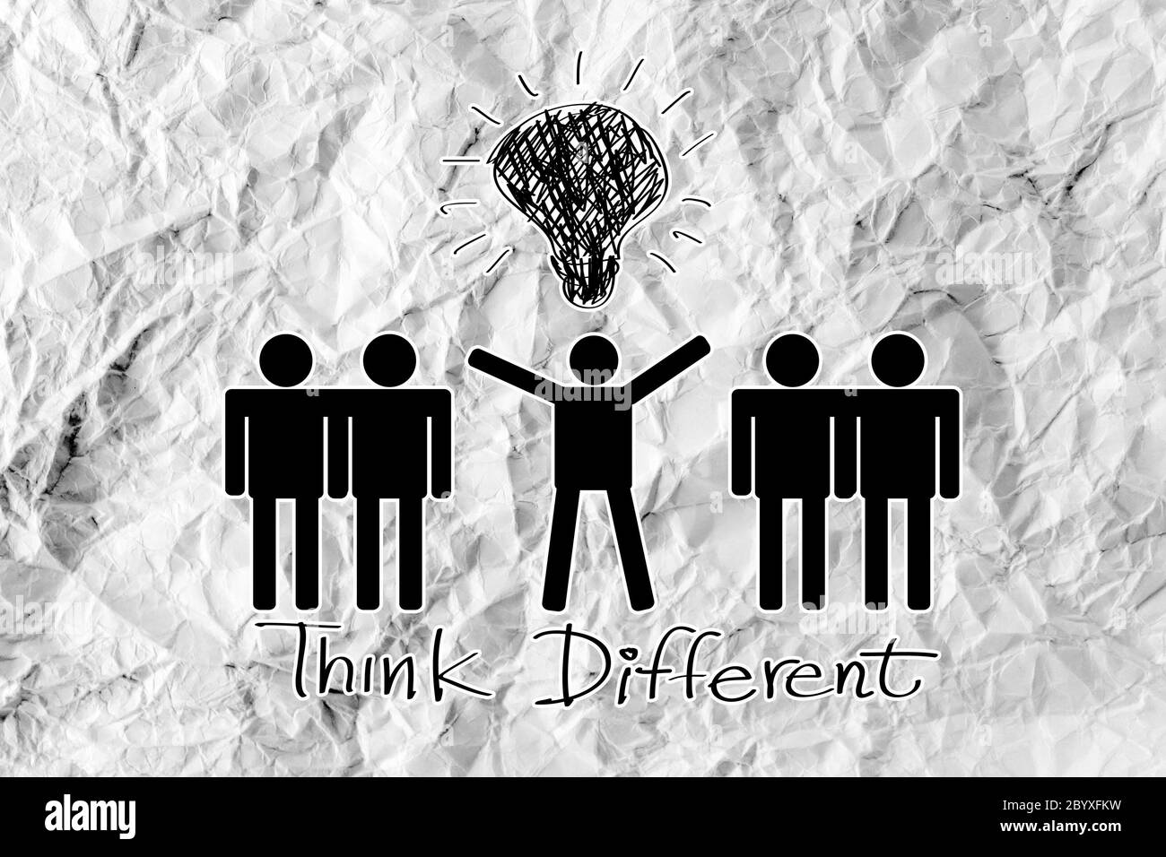 people icons think different idea design on crumpled paper Stock Photo ...