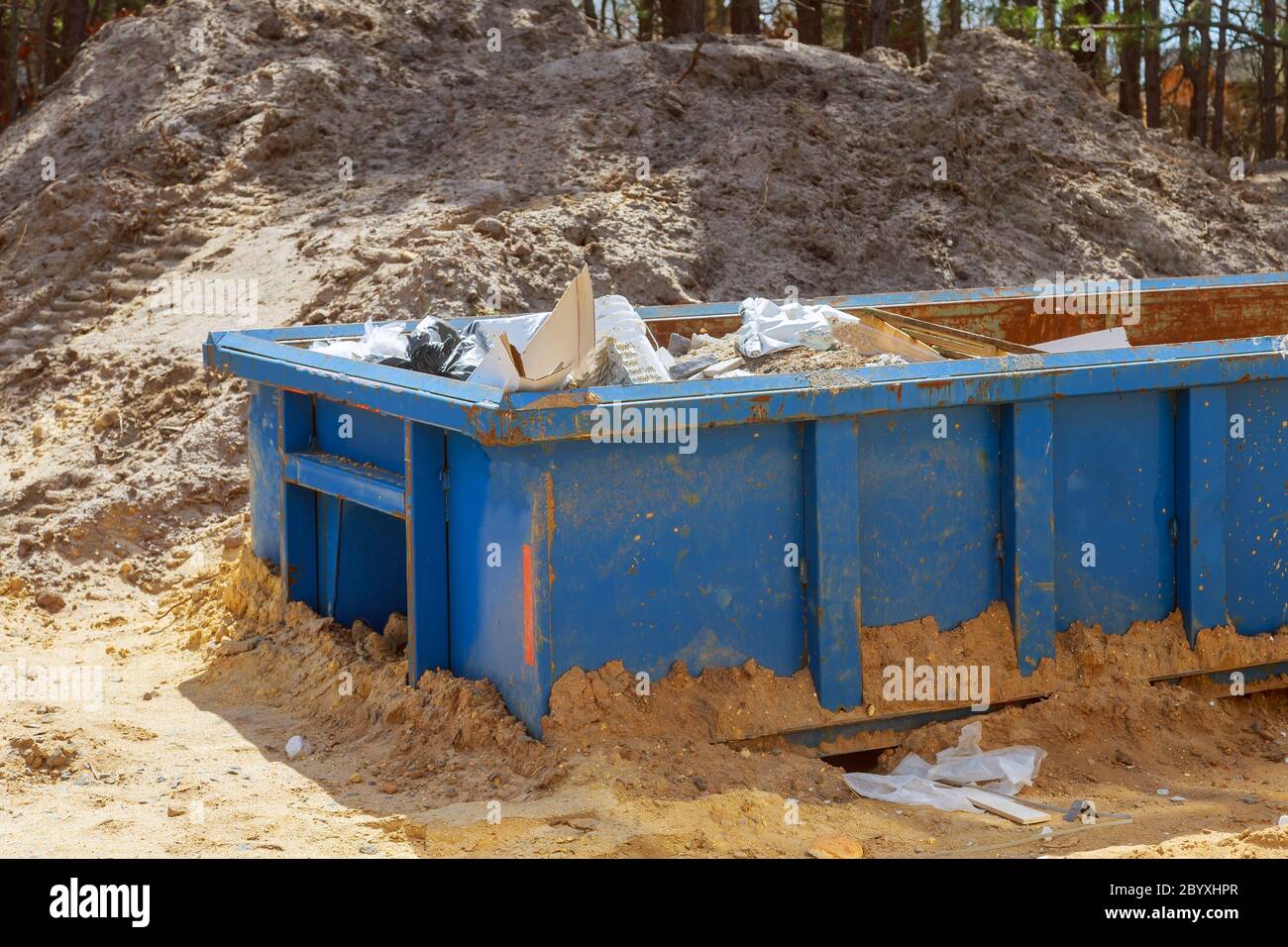 Construction trash dumpsters on metal container, house renovation Stock ...