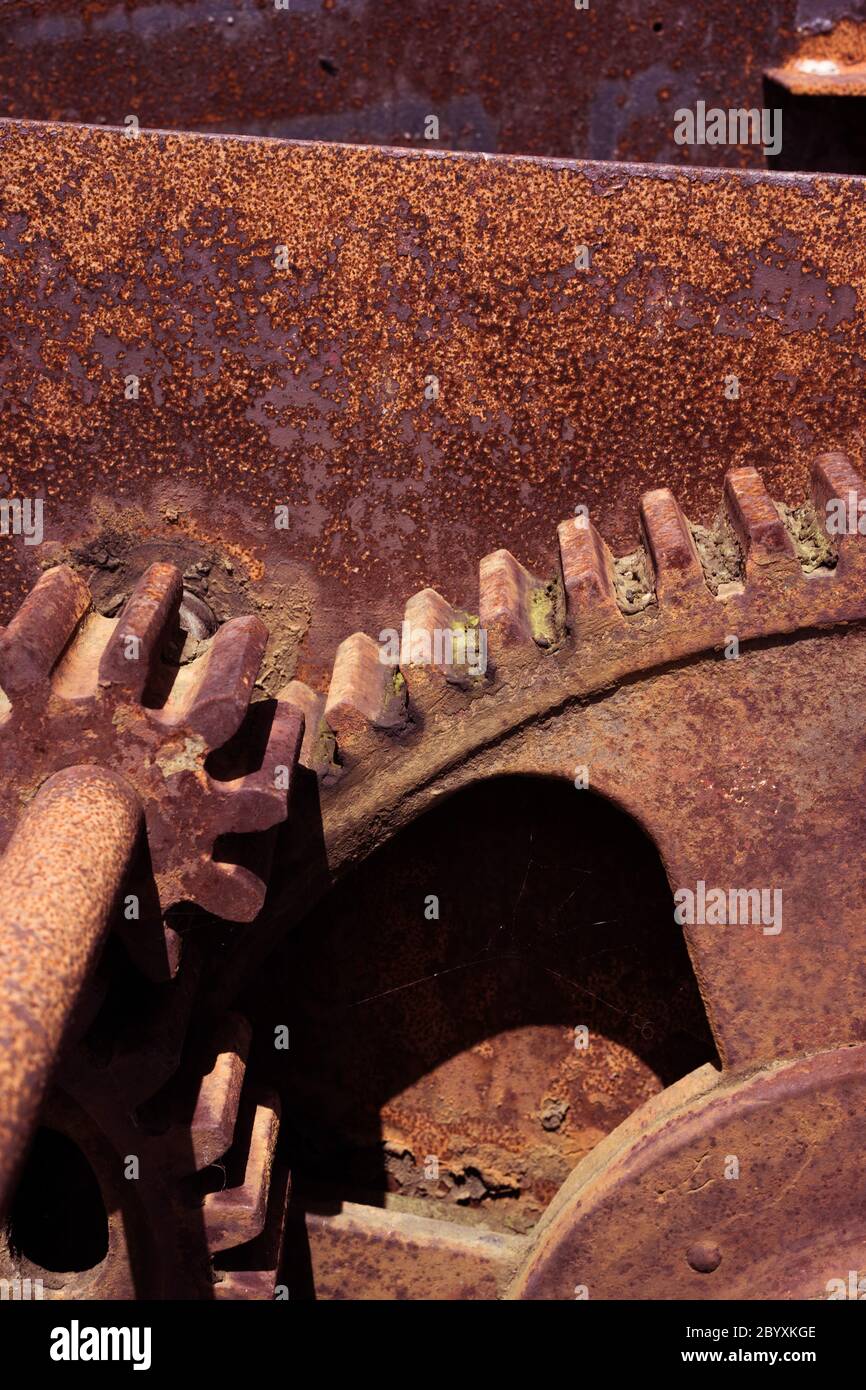Rusty cogwheels mechanism of a derelict machine Stock Photo - Alamy