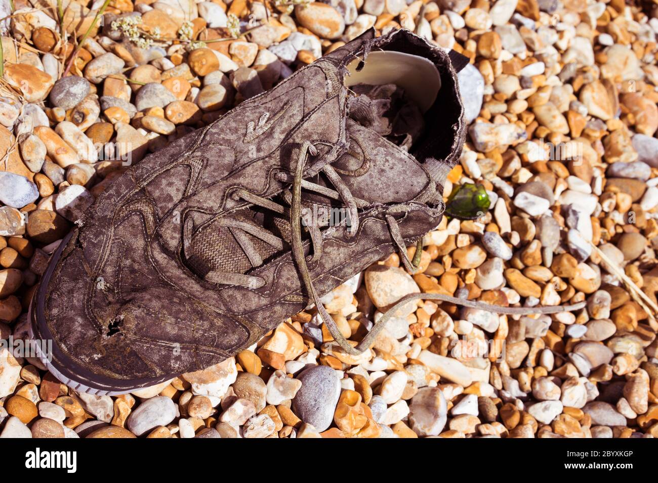 Filthy dirty rotting old lace up shoe Stock Photo - Alamy
